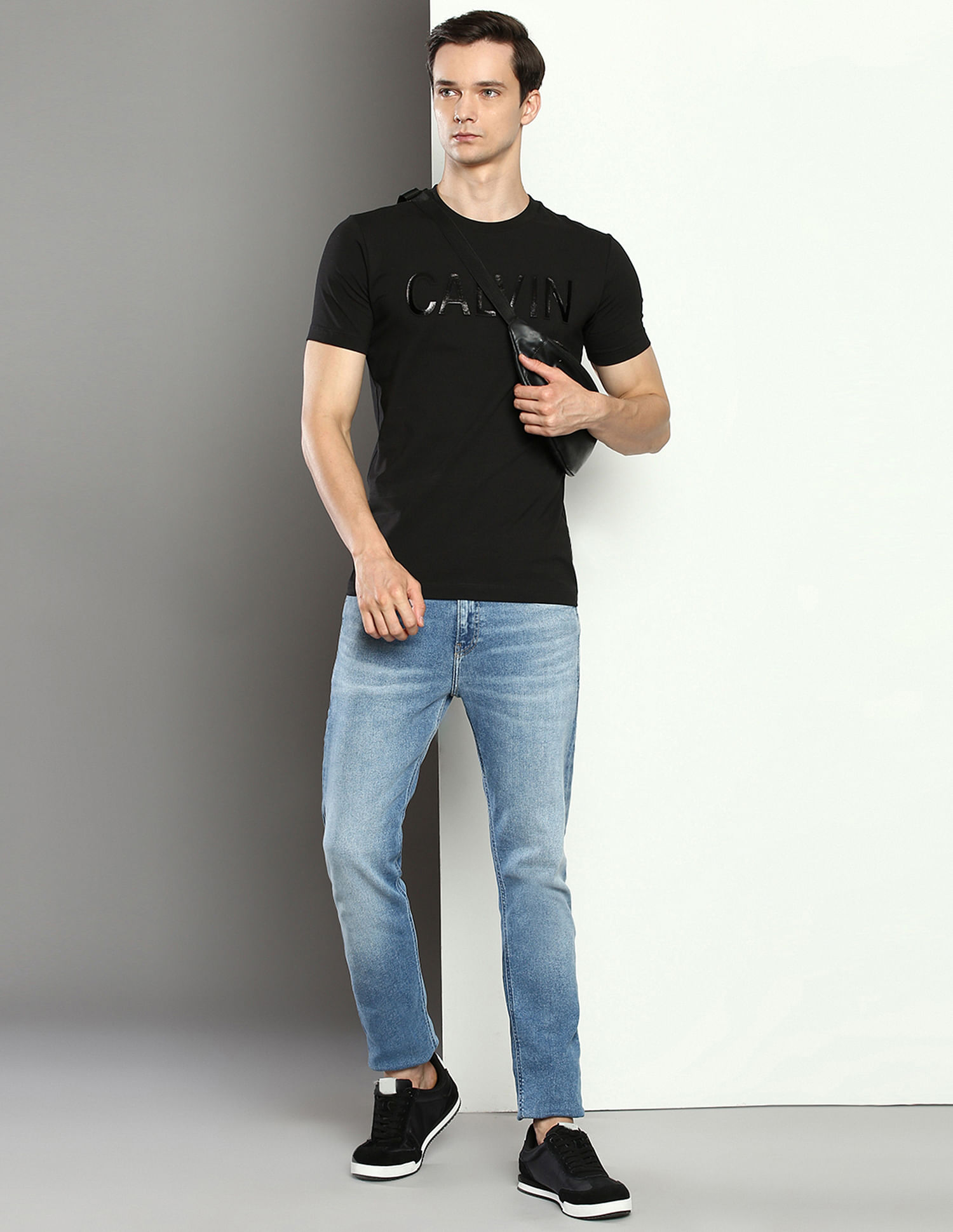 Buy Calvin Klein Jeans Regular Fit Embossed T-Shirt - NNNOW.com Buy Calvin Klein Jeans Regular Fit Embossed T-Shirt - NNNOW.com